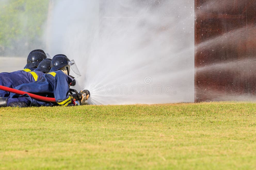 Firefighter Fighting for Fire Attack Training Editorial Image - Image ...