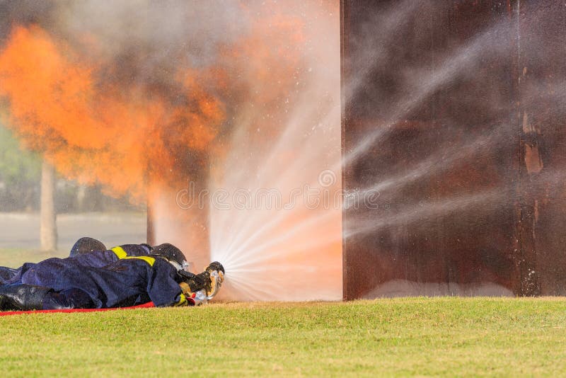 Firefighter Fighting for Fire Attack Training Editorial Photo - Image ...