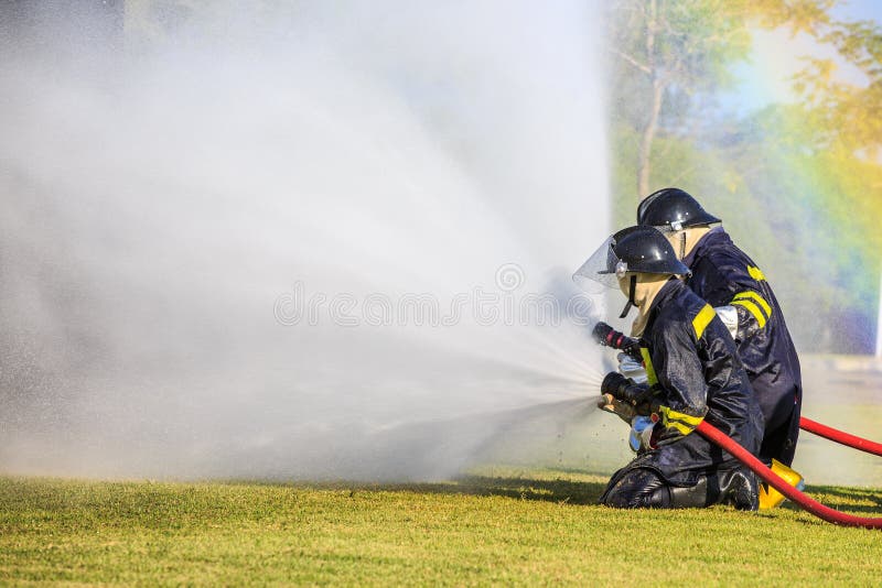 Firefighter Fighting for Fire Attack Training Stock Photo - Image of ...
