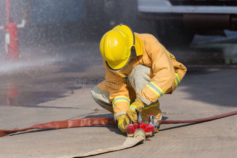 Firefighter Fighting for a Fire Attack Stock Image - Image of fighting ...