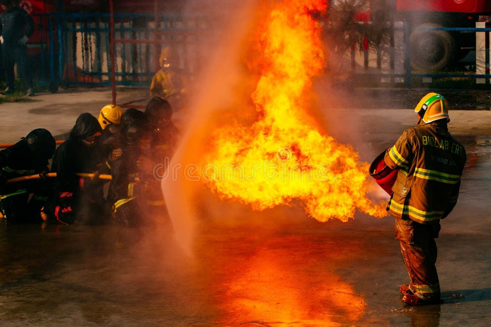Firefighter Fighting Fire during Training Editorial Stock Image - Image ...