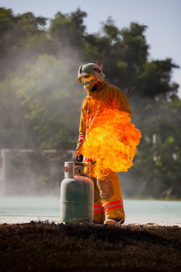 Firefighter with Fire and Suit for Protect Fire Fighter for Training ...