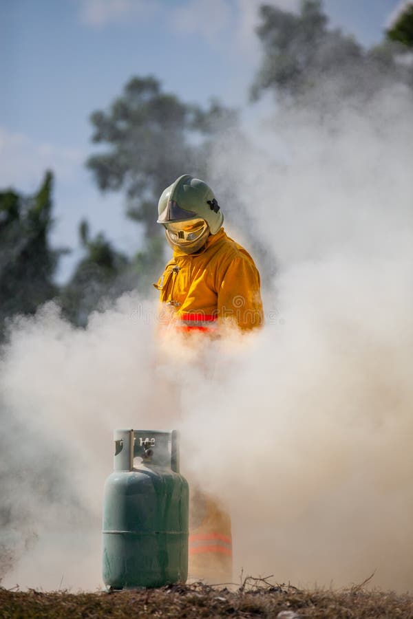 Firefighter with Fire and Suit for Protect Fire Fighter for Training ...