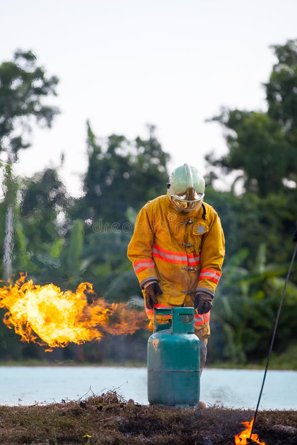 Firefighter with Fire and Suit for Protect Fire Fighter for Training ...