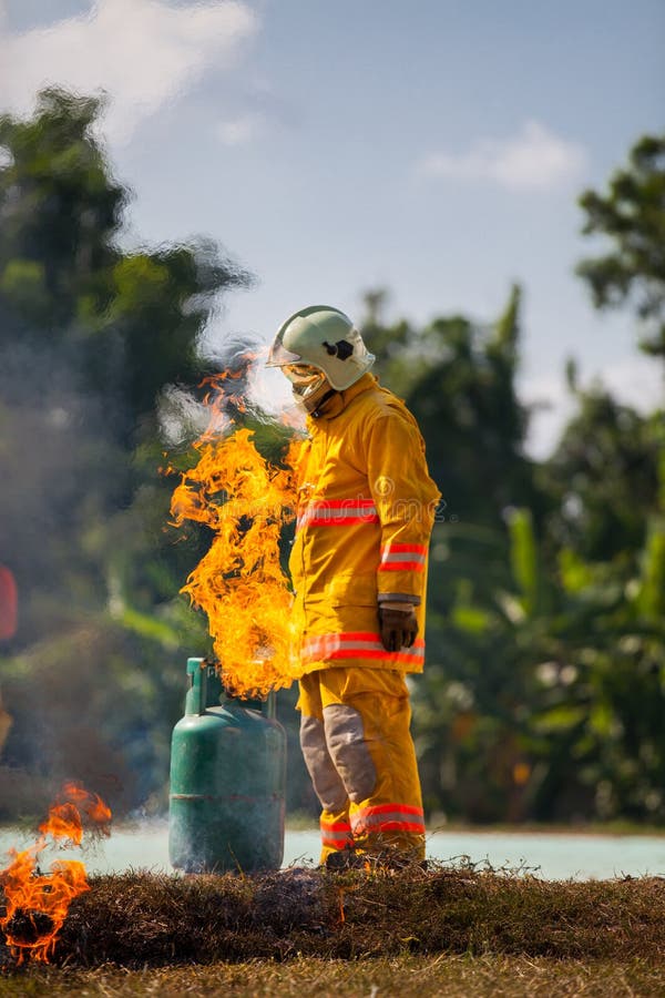 Firefighter with Fire and Suit for Protect Fire Fighter for Training ...