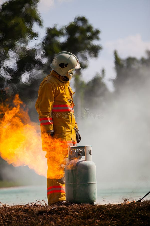 Firefighter with Fire and Suit for Protect Fire Fighter for Training ...