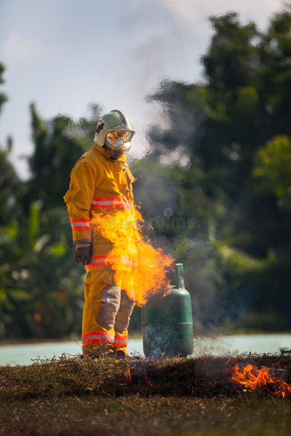 Firefighter with Fire and Suit for Protect Fire Fighter for Training ...