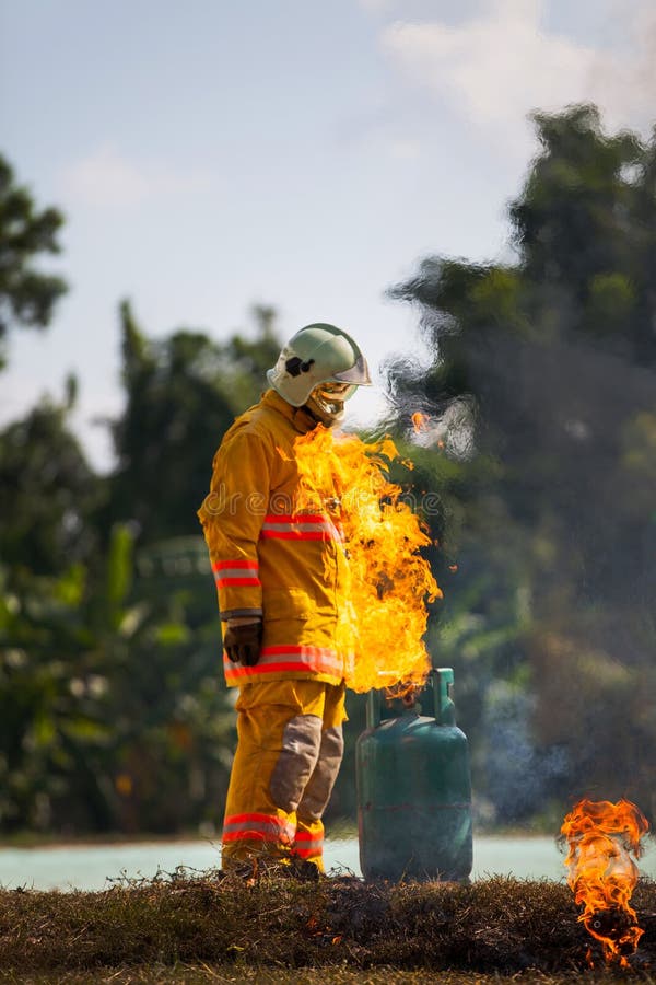 Firefighter with Fire and Suit for Protect Fire Fighter for Training ...