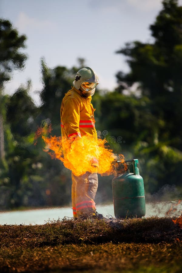 Firefighter with Fire and Suit for Protect Fire Fighter for Training ...
