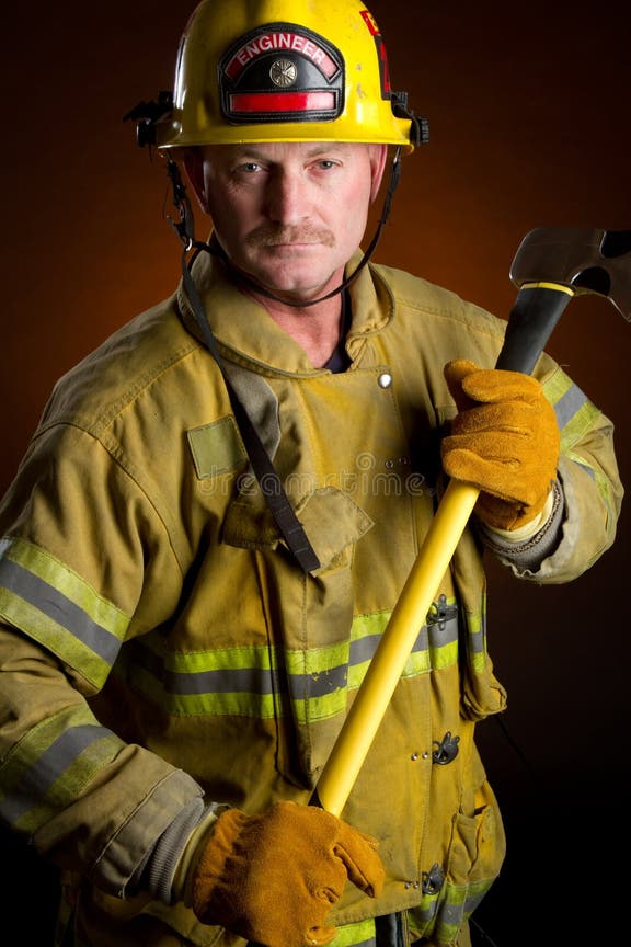 Firefighter Fireman stock image. Image of handsome, helmet - 14000523