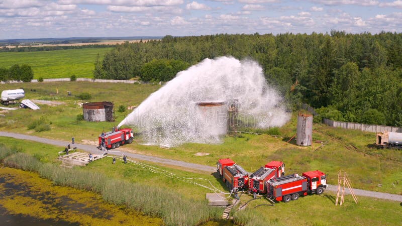 Firefighter or Fireman on Fire Truck Practicing at the Training Ground ...