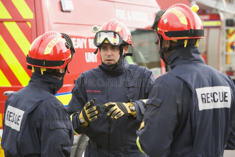 A Firefighter Giving Instructions To His Team Stock Image - Image of ...