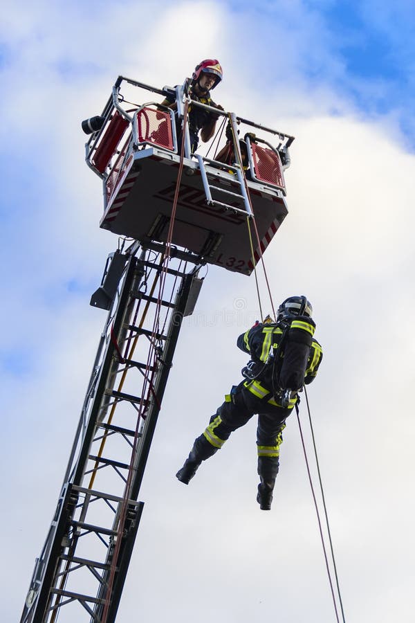 Firefighter Going Down a Rope Editorial Stock Photo - Image of fireman ...