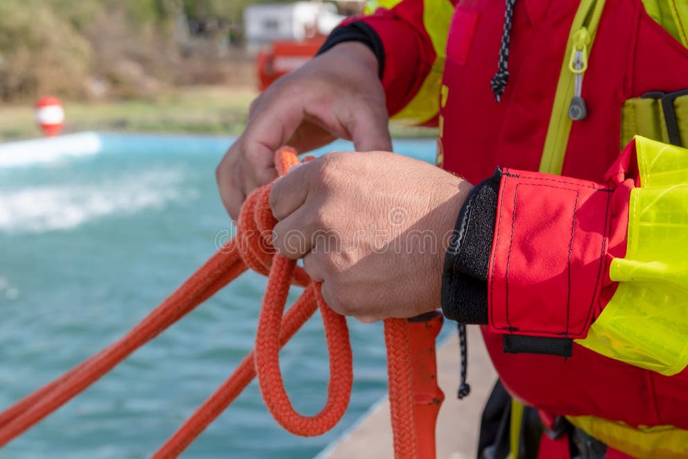 Firefighter Hands Tying Rope Knot Stock Photo - Image of emergency ...