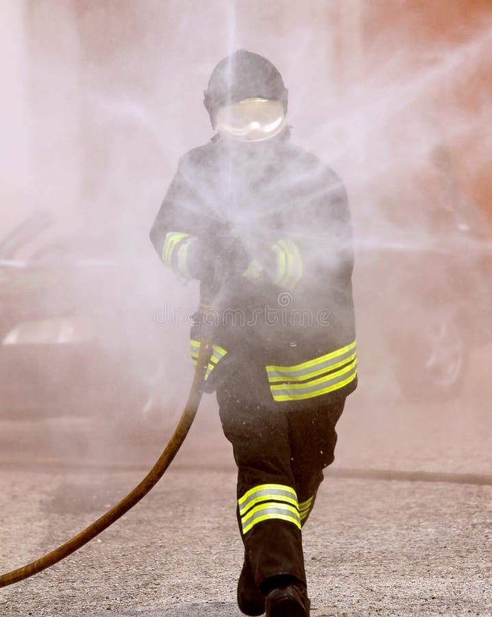 Firefighter with an Helmet during Emergency Stock Image - Image of ...