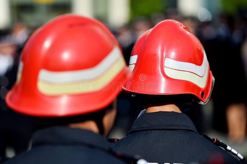 Firefighter Helmets Seen from Behind during Parade Stock Photo - Image ...