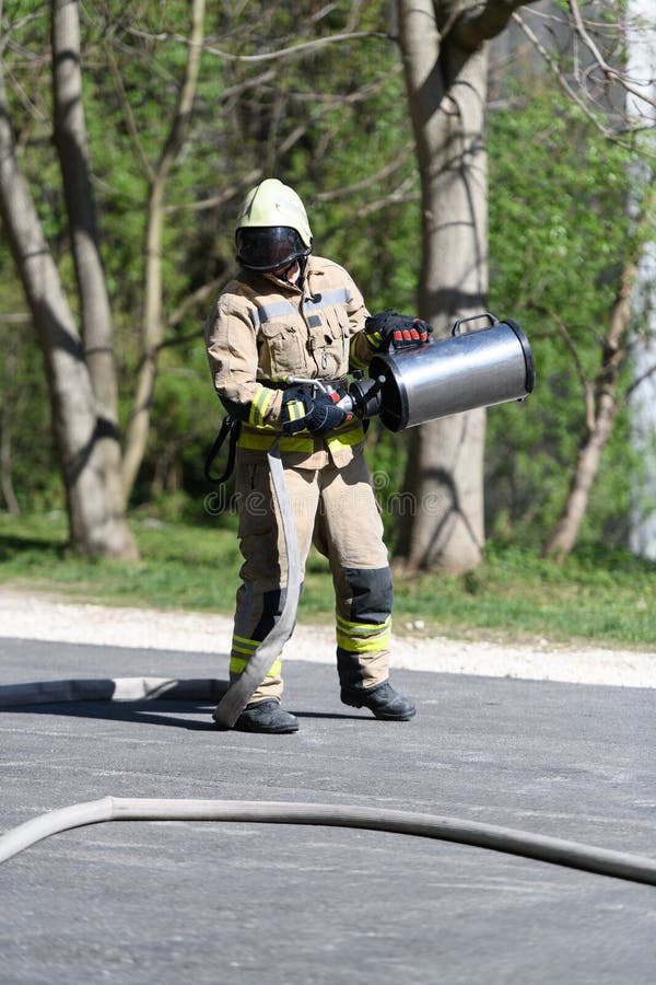 Firefighter Holding Foam Suppression Tool on Duty Editorial Photography ...