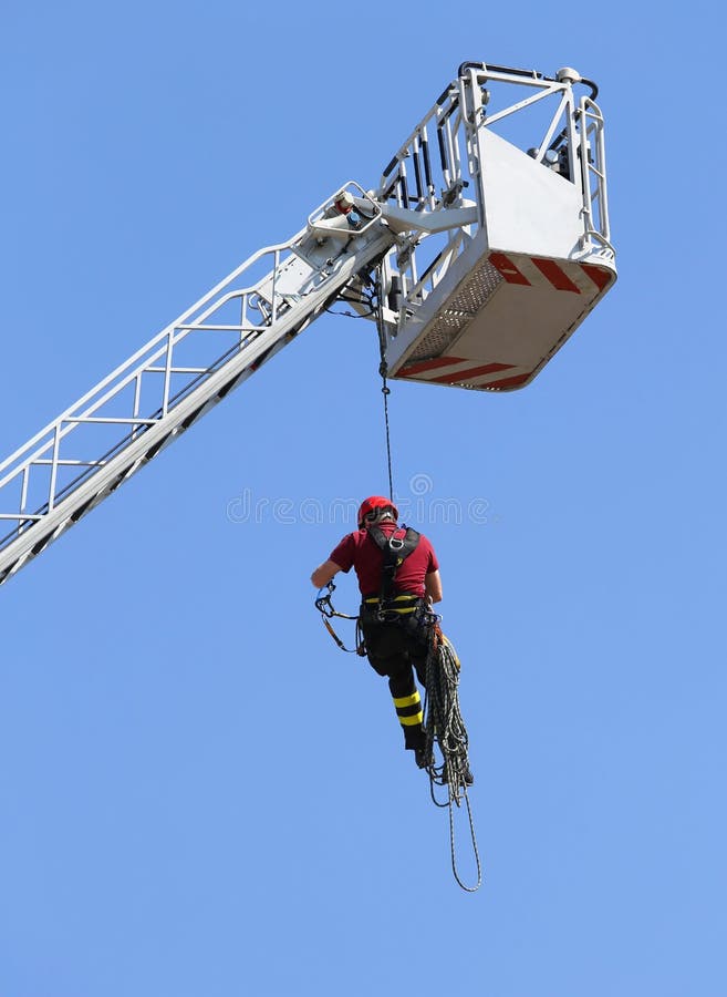 Firefighter Hung the Rope Climbing in the Fire Station Stock Photo ...
