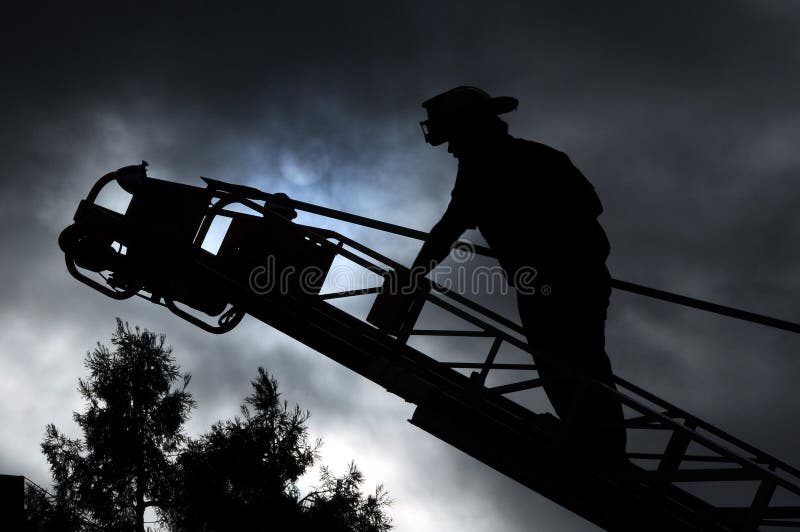 Firefighter on ladder stock photo. Image of arson, building - 13379280