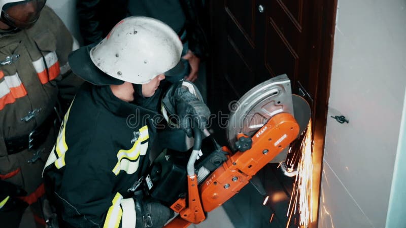 Firefighter metal saw stock video. Video of metalcutter - 114547465