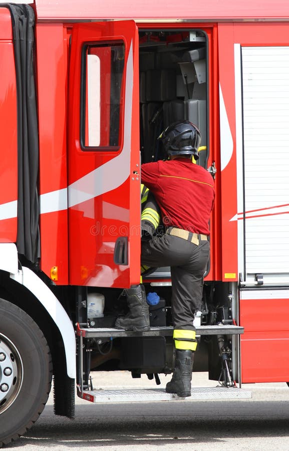 Firefighter Near the Fire Truck when Handling an Emergency Stock Image ...