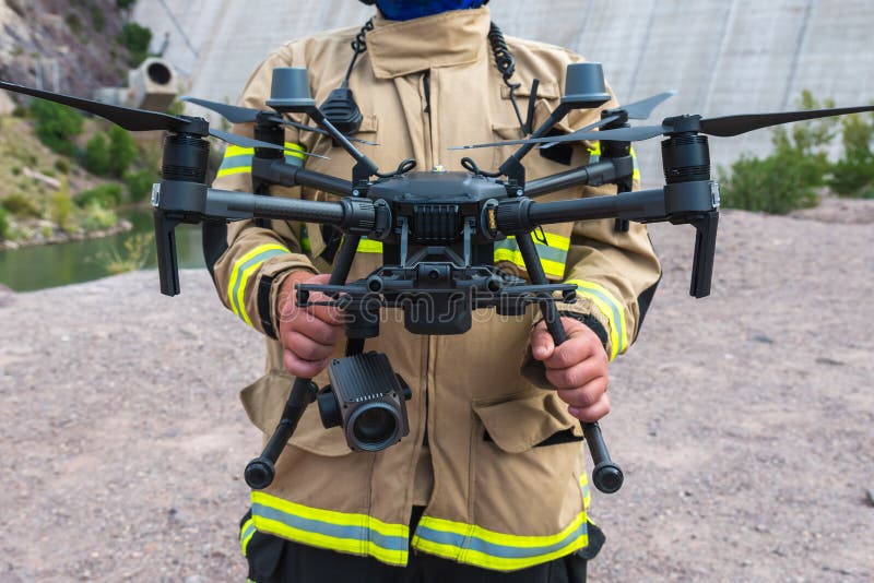 Firefighter Operating Drone in Search and Rescue Stock Image - Image of ...