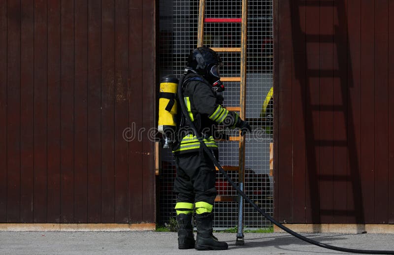 Firefighter with Oxygen Tank during a Training Exercise at the Fire ...