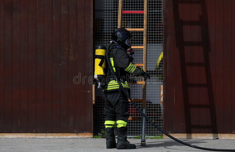Firefighter with Oxygen Tank during a Training Exercise at the Fire ...