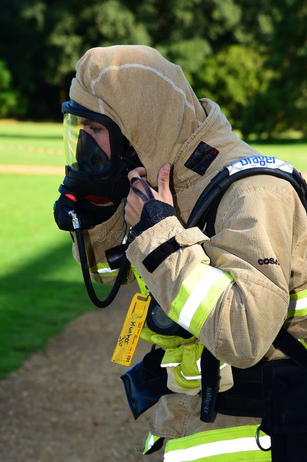Firefighter Prepares His Breathing Apparatus at Fire Scene Editorial ...