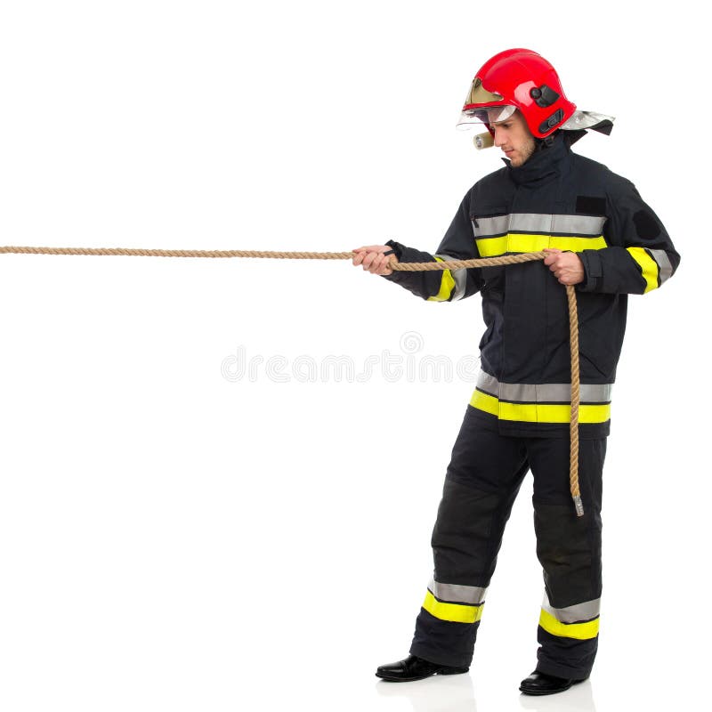 Firefighter pulling a rope stock photo. Image of full - 38318704