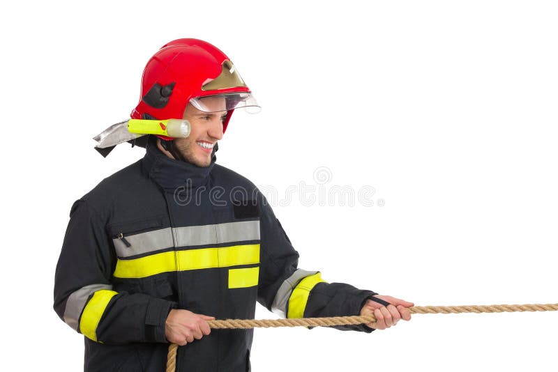 Firefighter pulling a rope stock photo. Image of hand - 42095094