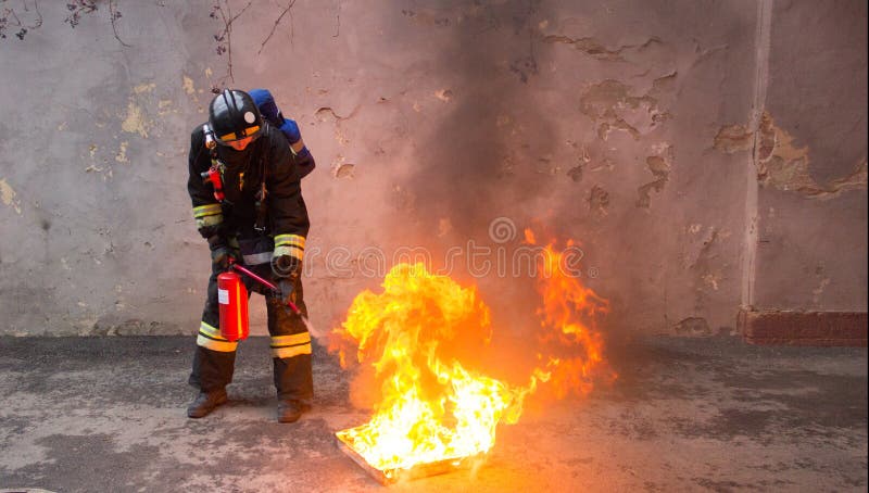Firefighter Puts Out the Fire Stock Image - Image of crash, alert ...