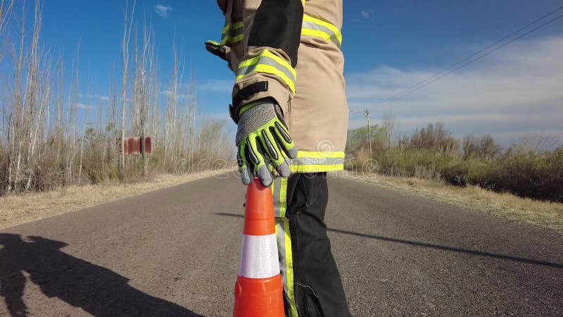 Firefighter Putting Cone on Road Stock Footage - Video of white ...