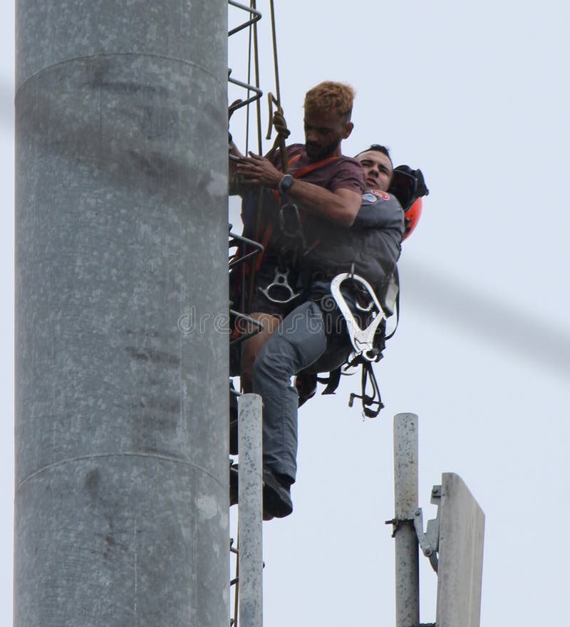 Firefighter Rescue a Man editorial image. Image of tower - 323305970