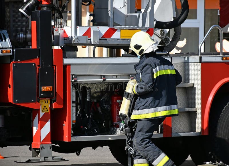 Firefighter at the Scene of a Fire Stock Photo - Image of helmet ...