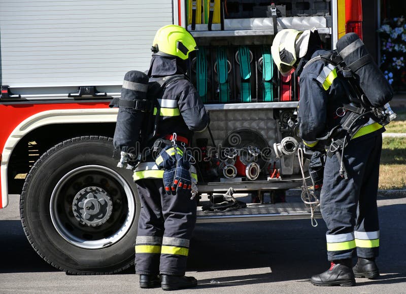Firefighter at the Scene of a Fire Stock Image - Image of adult, engine ...