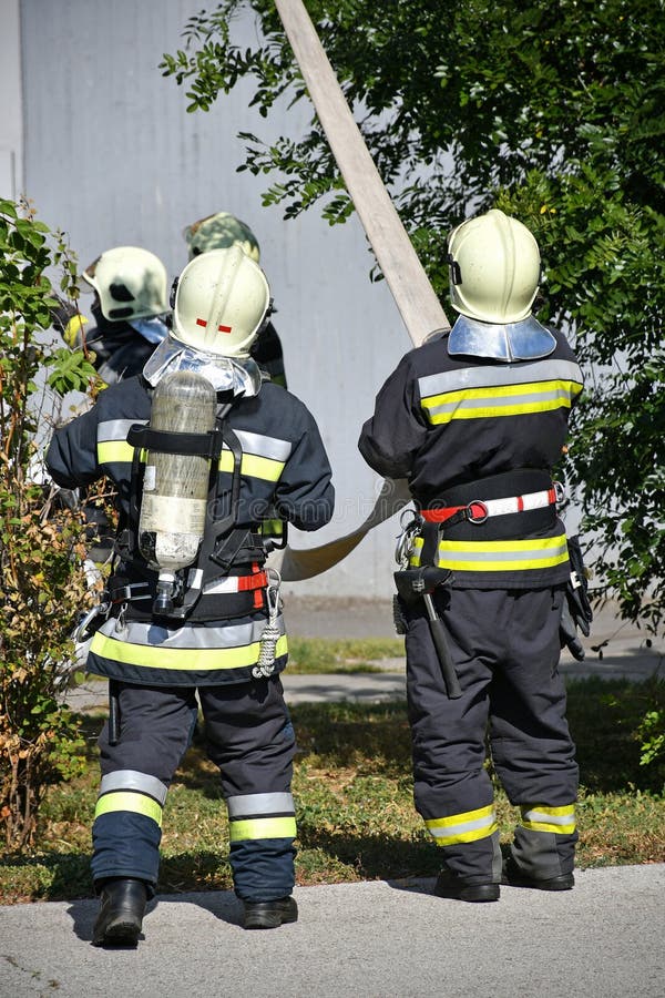 Firefighter at the Scene of a Fire Stock Image - Image of vehicle ...