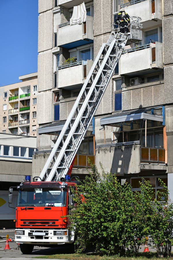 Firefighter at the Scene of a Fire Stock Image - Image of wear, hose ...