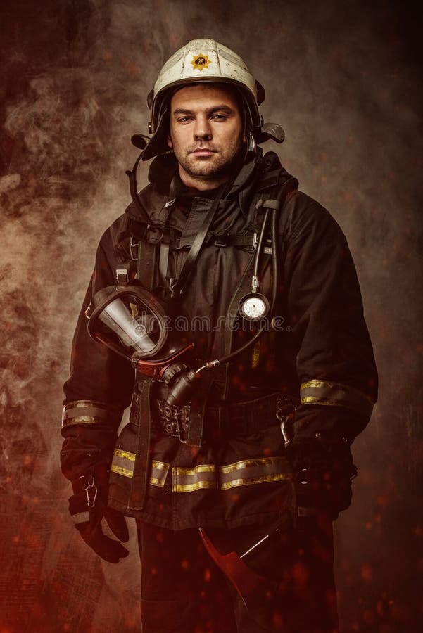 Firefighter in a smoke stock photo. Image of fire, people - 40795432