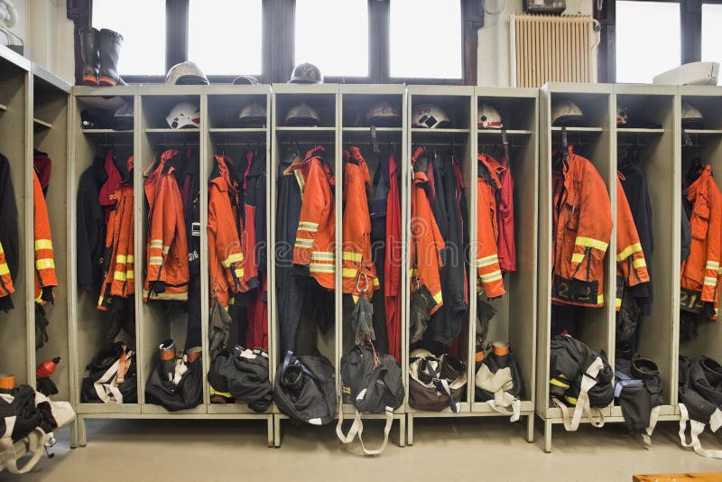 Firemen suits and helmets stock image. Image of firefighter - 23504007