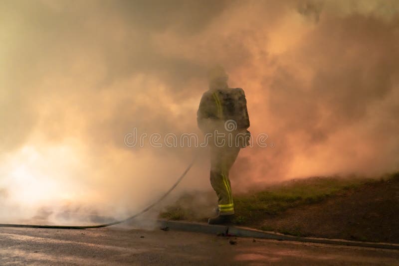 Firefighter stock image. Image of outdoor, danger, toxic - 148052549