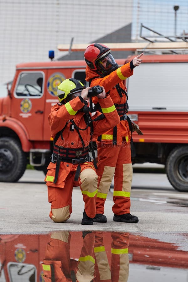 Firefighter Team Learning Thermal Camera Usage during Training Session ...