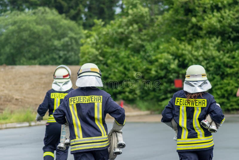 Firefighter Teamwork stock photo. Image of work, fireman - 3079080