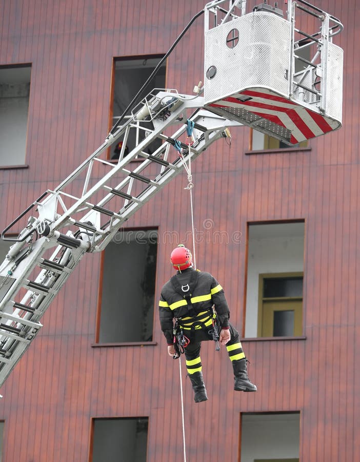 Firefighter during a Training Exercise with the Rope To Descend ...