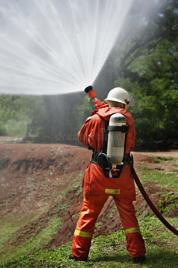 Firefighter during Training Stock Image - Image of fighter, assistance ...