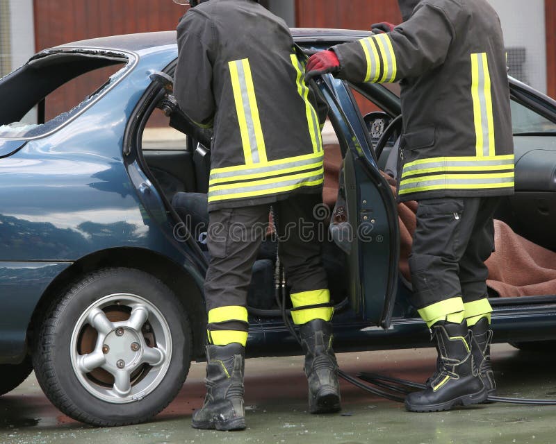 Firefighter Training To Extract Trapped Man in the Car Stock Photo ...