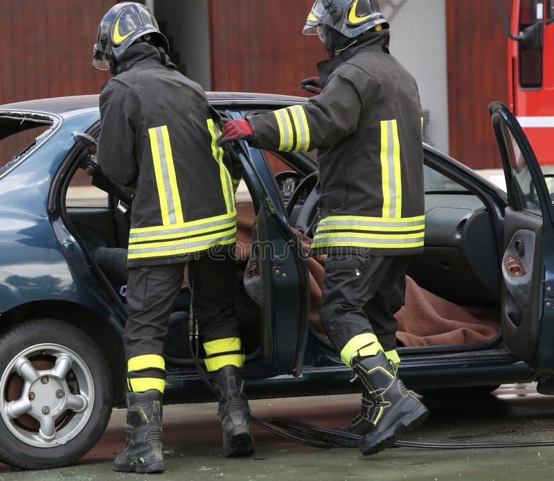Firefighter Training To Extract Trapped Man in the Car Stock Photo ...