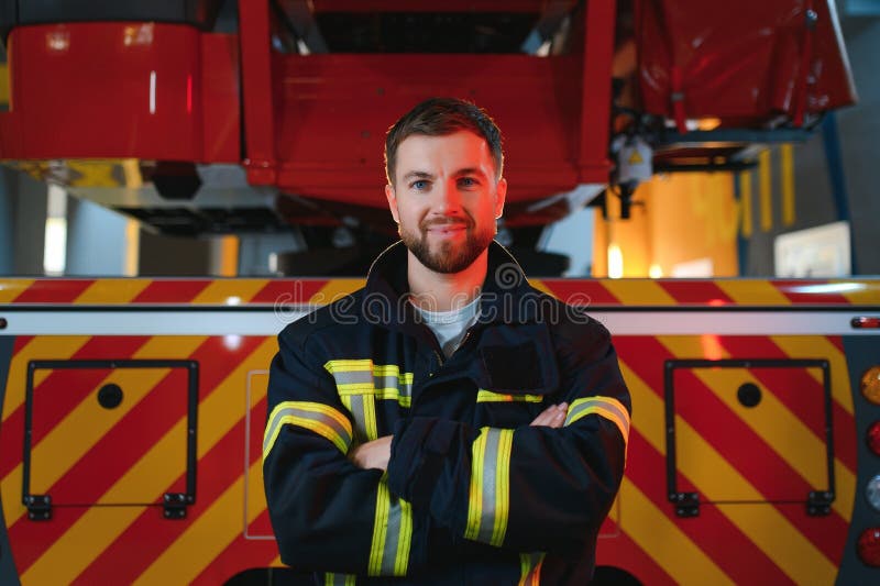 Firefighter in Uniform and Helmet Near Fire Engine Stock Image - Image ...
