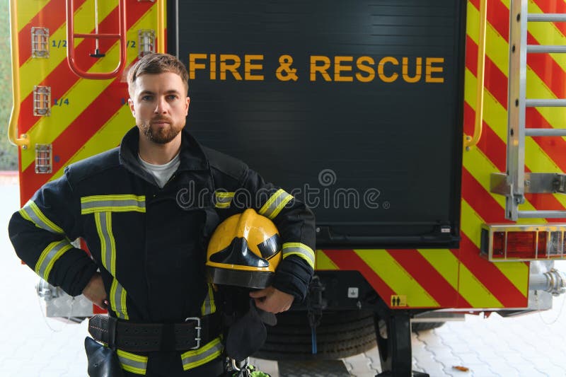 Firefighter in Uniform and Helmet Near Fire Engine Stock Image - Image ...
