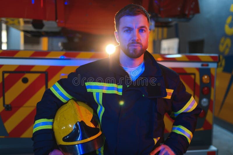 Firefighter in Uniform and Helmet Near Fire Engine Stock Image - Image ...